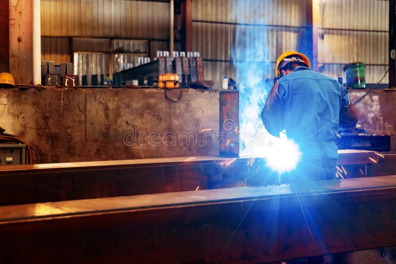Workers at Work, Ongoing Welding Operation Stock Image - Image of light ...