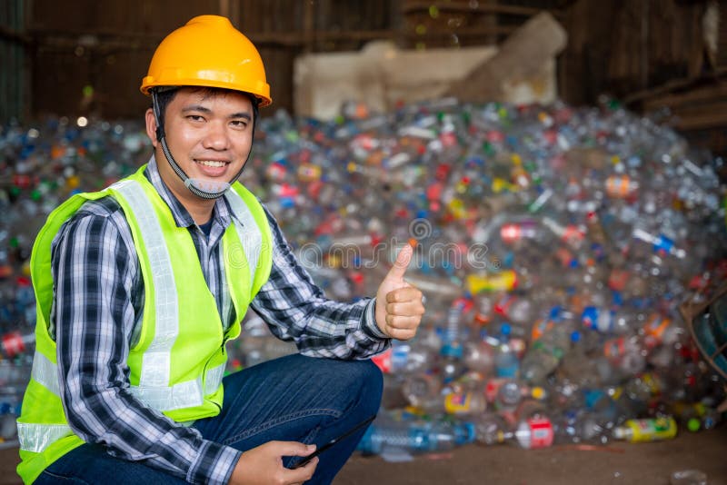 A Workers Work on Recycle Waste at Recycling Factory Stock Photo ...