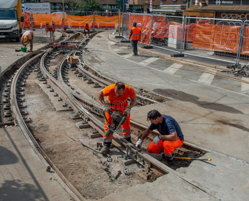 Workers at Work while Sistenabo the Tram Rails Editorial Stock Photo ...