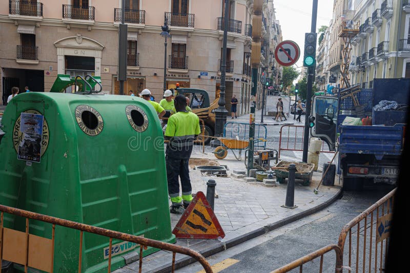 Workers at Work on the Street To Fix a Problem on a City Road Stock ...