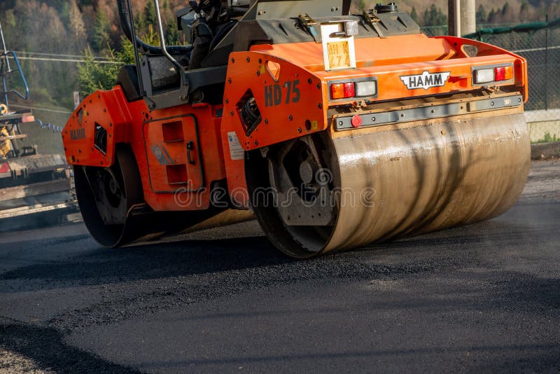 Workers at Work To Redo the Road Surface Editorial Stock Photo - Image ...