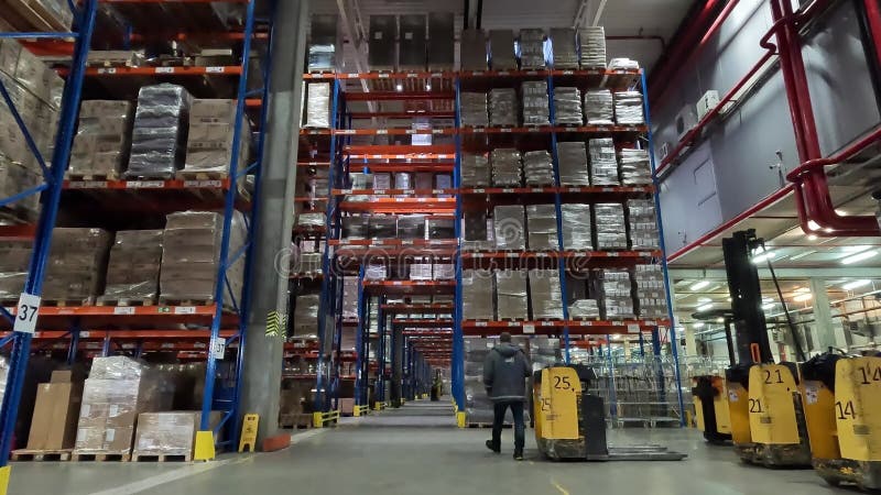 Workers Work in the Warehouse General Plan Time Lapse. Large Modern ...