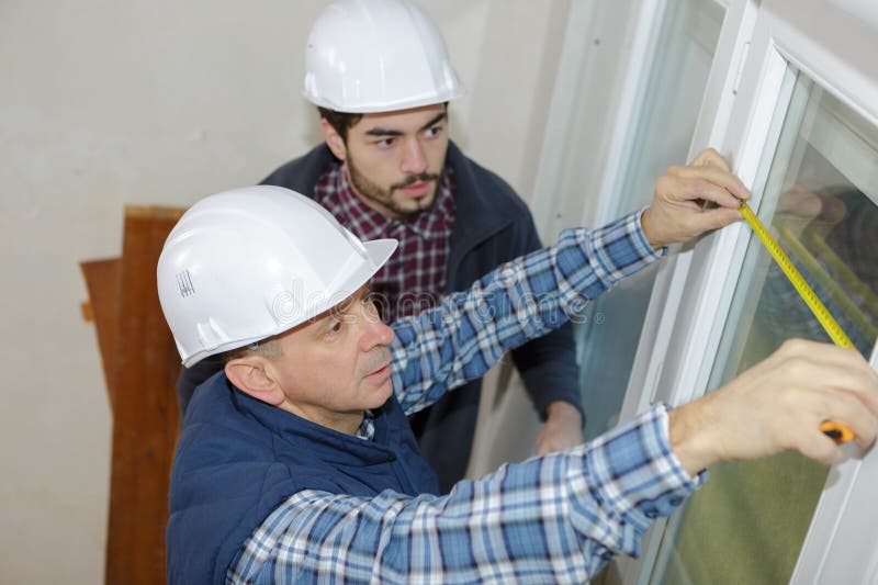 Workers Working with Glass for Windows at Workshop Stock Image - Image ...