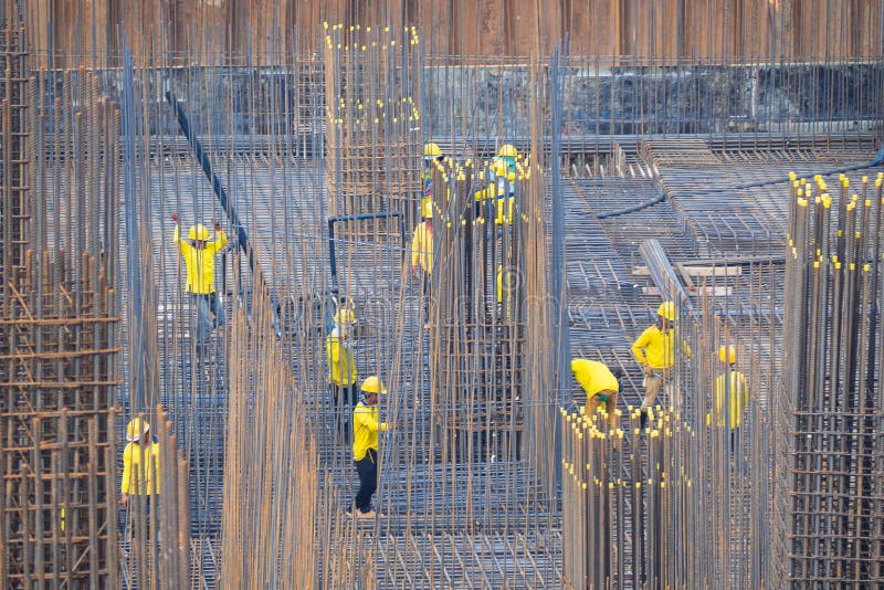 Workers are Working Helping To Construct Building in the Construction ...