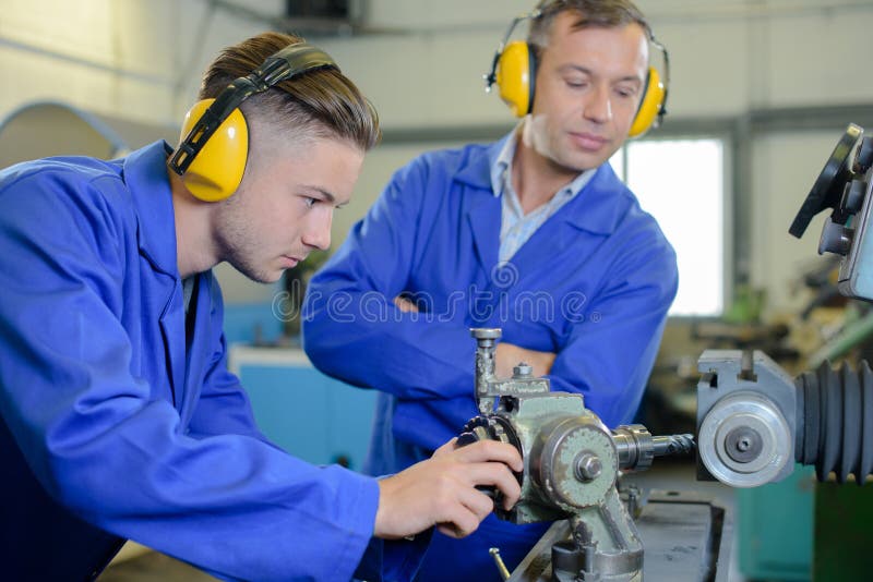 Workers Working with Machine Stock Photo - Image of assemble, machine ...