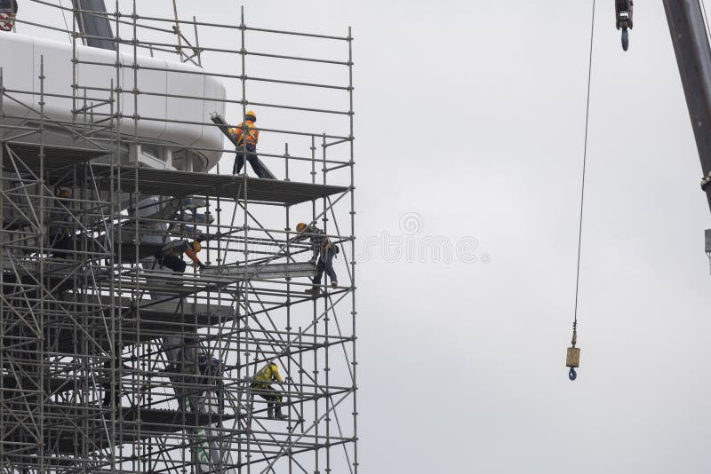 Workers Working on Scaffolding of Building Editorial Stock Photo ...