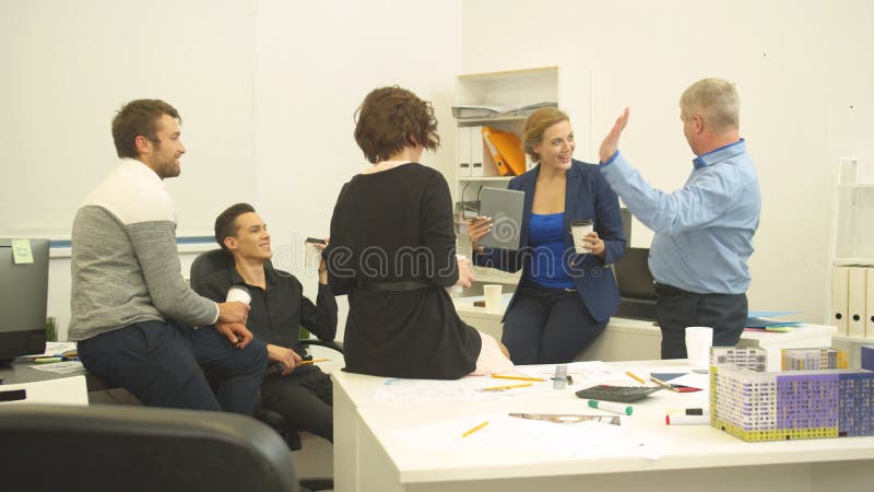 Workgroup Have a Break Time, they are Talking and Laughing Stock Photo ...
