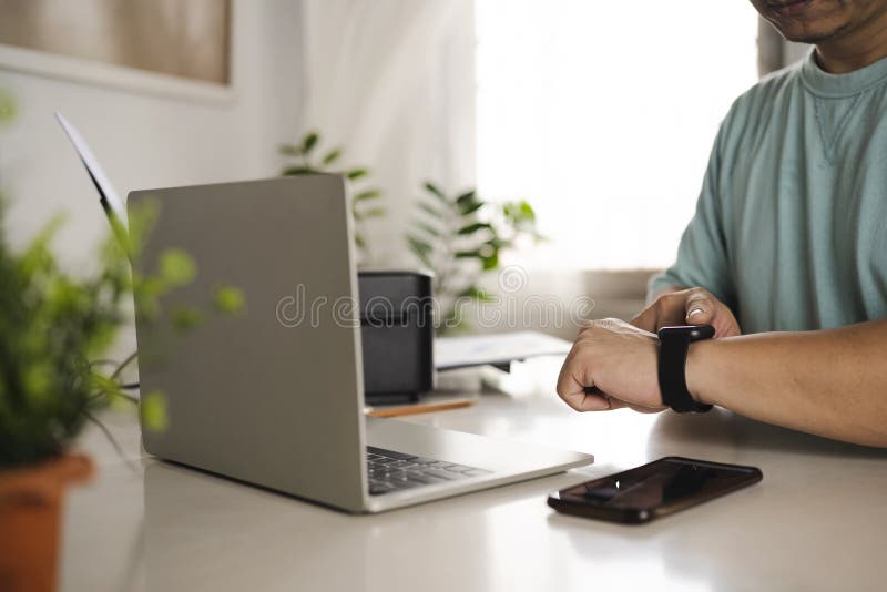 Working All Day, Close-up of Man Wearing Smart Watch Using Laptop Stock ...