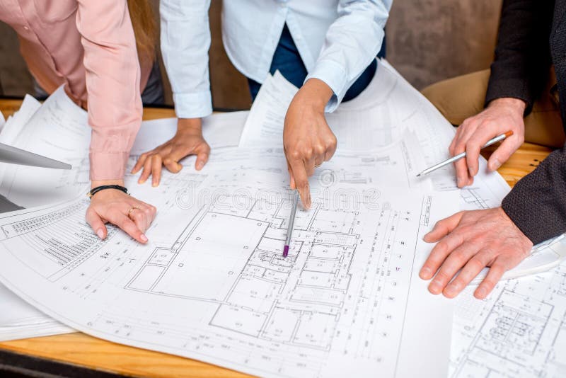Working on Architectural Drawings Stock Image - Image of professional ...