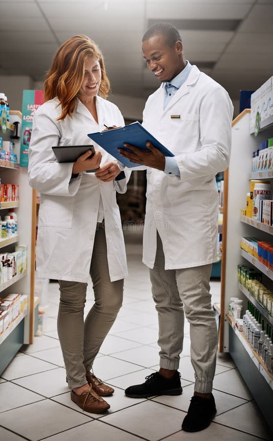 Working Around the Clock To Keep Their Pharmacy Running Smoothly. Two ...