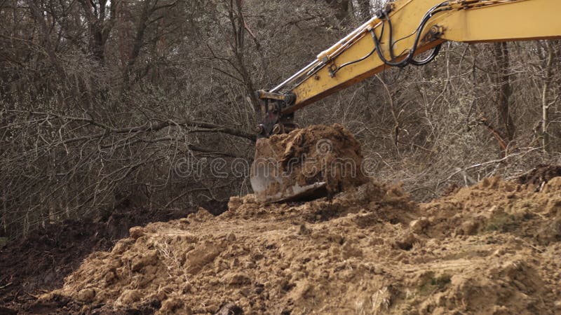 Working Backhoe by Digging Ground at Construction Site. Excavator ...