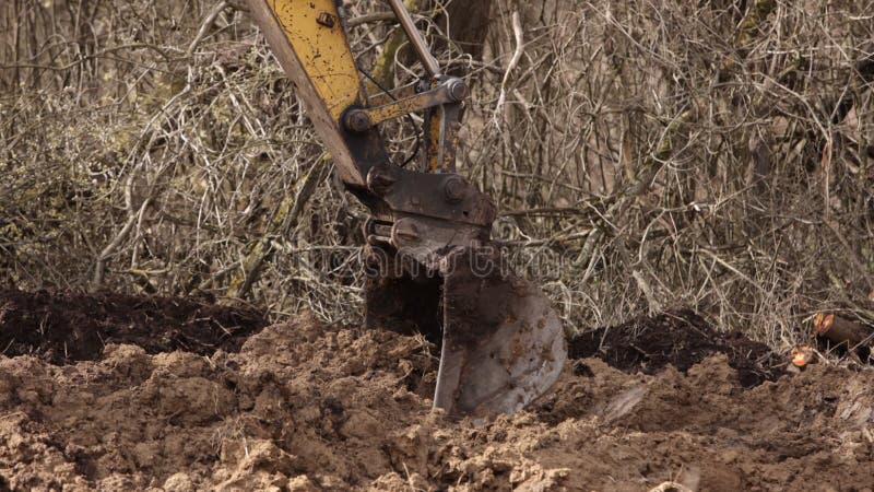 Working Backhoe by Digging Ground at Construction Site. Excavator ...