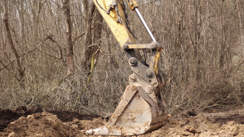 Working Backhoe by Digging Ground at Construction Site. Excavator ...