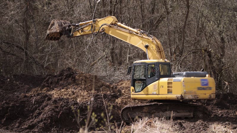 Working Backhoe by Digging Ground at Construction Site. Excavator ...