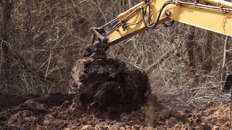 Working Backhoe by Digging Ground at Construction Site. Excavator ...