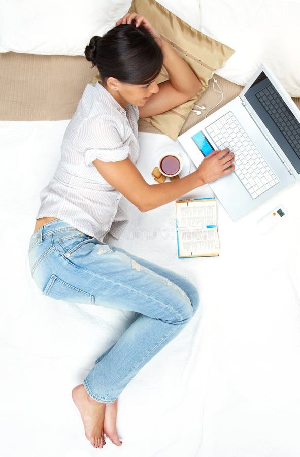 Working in bed stock image. Image of notebook, computer - 16537959