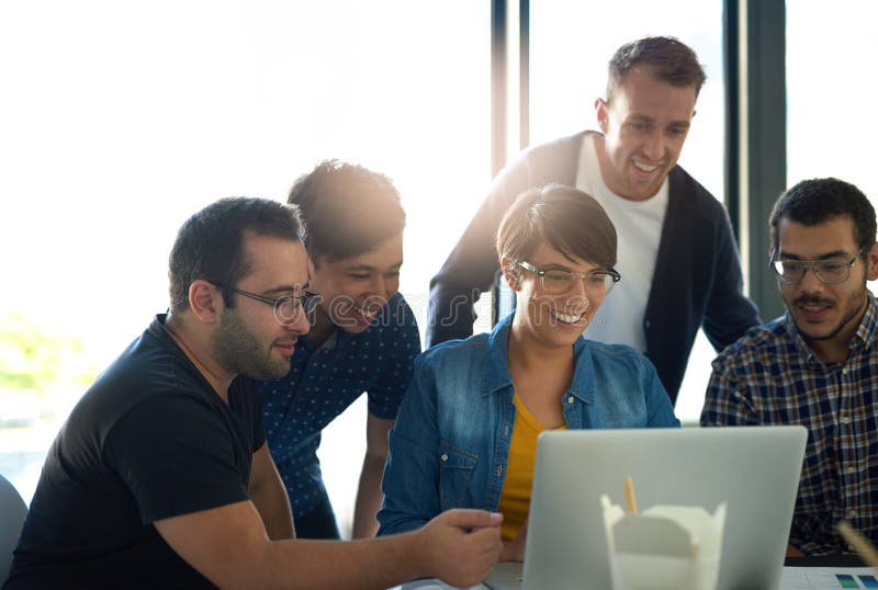 Working on a Big Presentation. a Group of Colleagues Having a Meeting ...