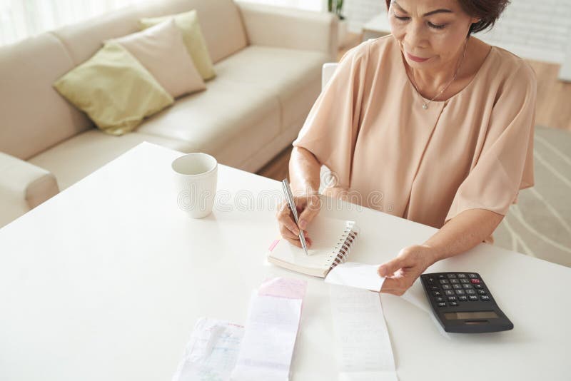 Working with bills stock photo. Image of mature, financial - 93086224