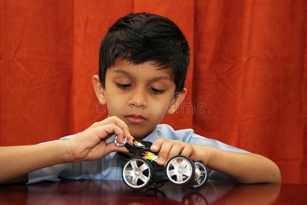 Working boy stock photo. Image of curious, fixing, active - 12469898