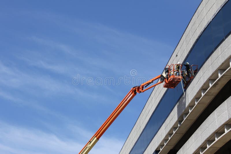 Working on a Building in the City Stock Image - Image of clouds ...