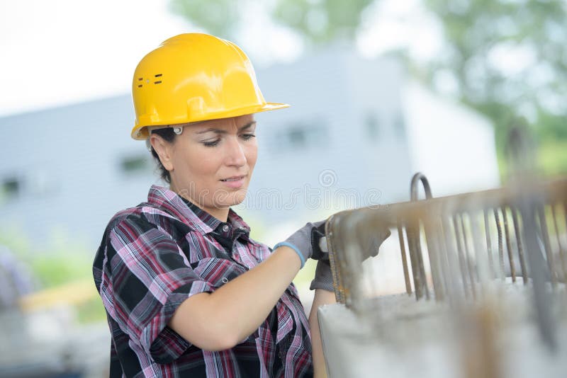 Working on building site stock image. Image of steel - 99846155