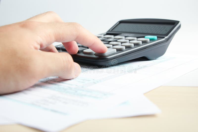 Working with a calculator stock image. Image of analytical - 55102439