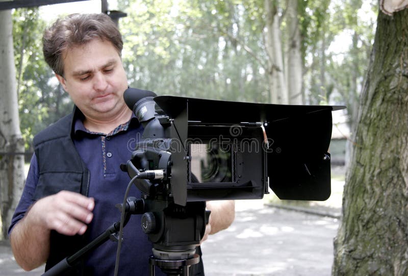 Cameraman at work stock photo. Image of media, indoors - 17457226