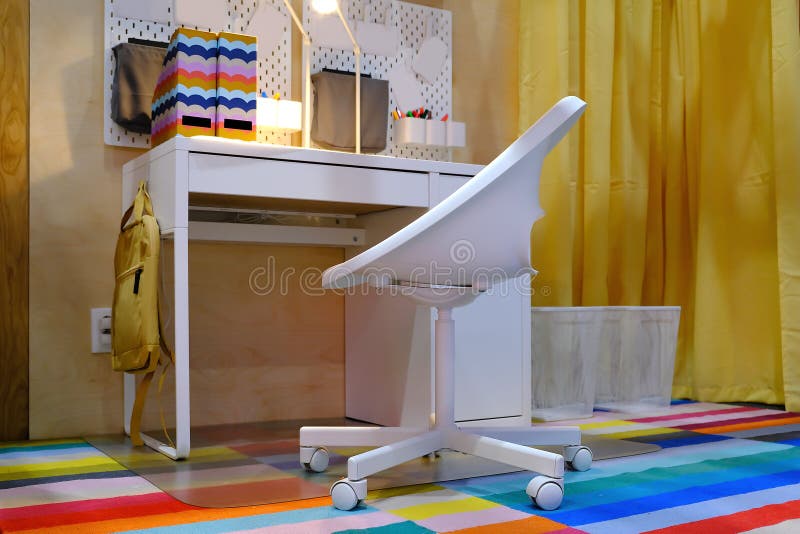 Working Children`s Table with a Chair. Office Supplies on the Table ...