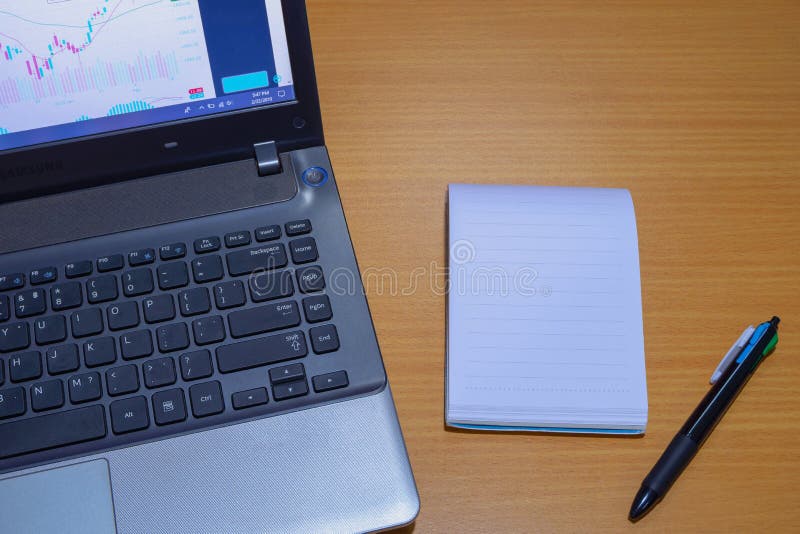 Working with the Computer, Along with Book and Pen Stock Photo - Image ...