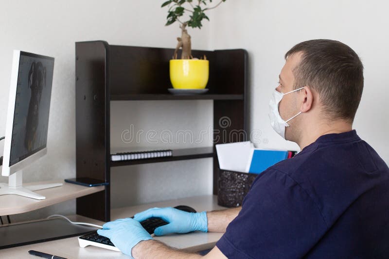 Working at the Computer in a Mask and Gloves Stock Photo - Image of ...