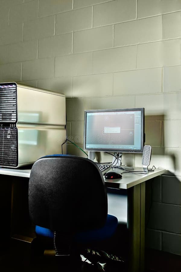 Working Computer Room Including a Monitor, System Unit and Chairs Stock ...