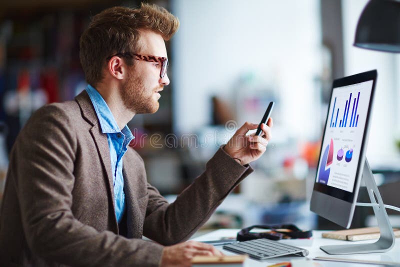 Working on computer stock photo. Image of table, looking - 63819310