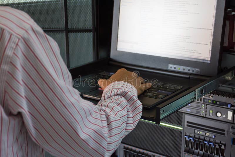 Working on computer server stock image. Image of computer - 76719395