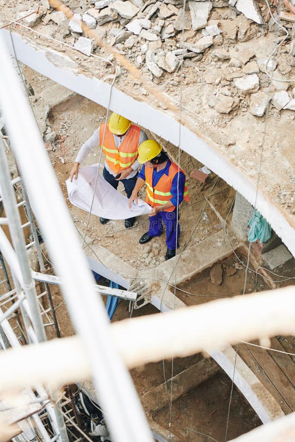 Working at Construction Site Stock Photo - Image of multiethnic, worker ...