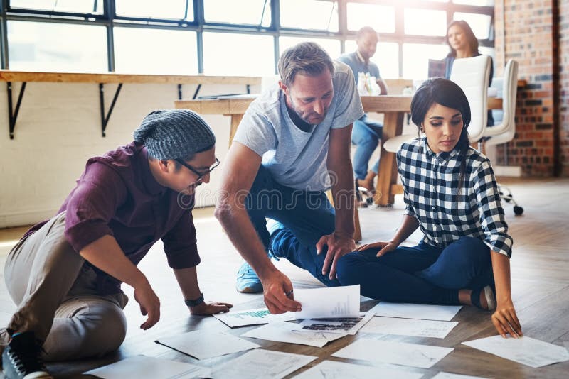 Working through the Creative Landscape. a Group of Businesspeople ...