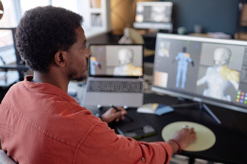 Working on 3D Animation Project in Modern Office Setting Stock Photo ...