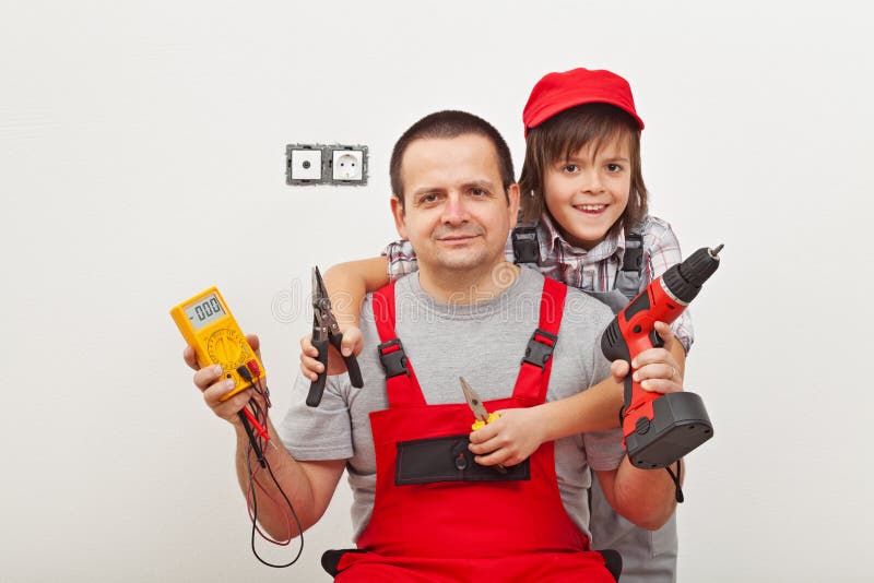 Working with Dad - Happy Boy Helping His Father Stock Photo - Image of ...