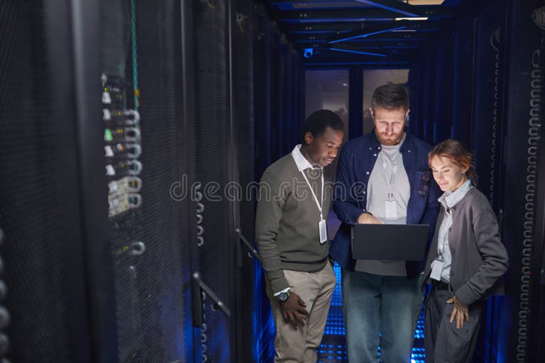 Working in Data Center Evaluating Server Performance Stock Photo ...