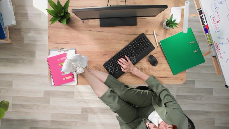 Working Day, Female Worker Talking on Phone and Typing on Computer ...