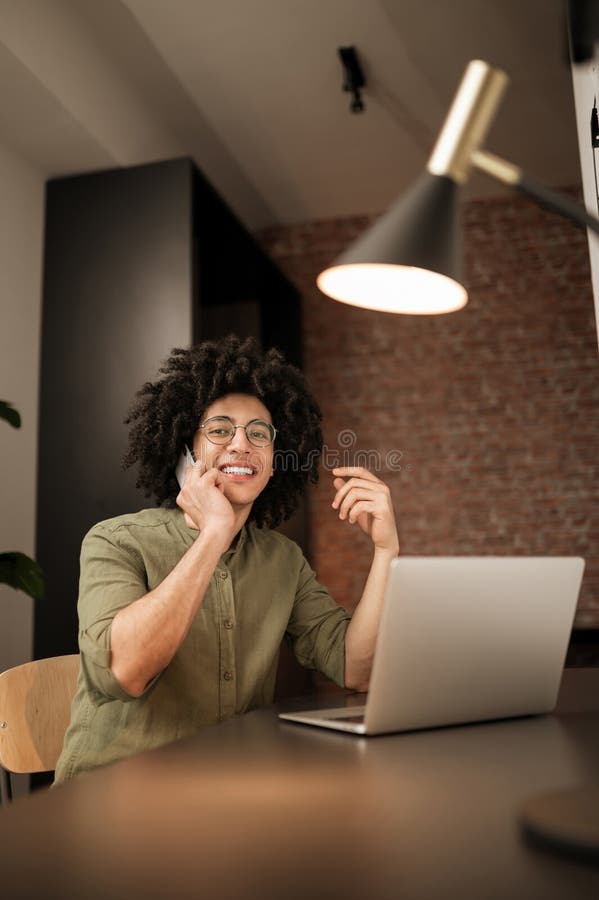 Young Man Working at the Table in a Hotel Room Stock Photo - Image of ...