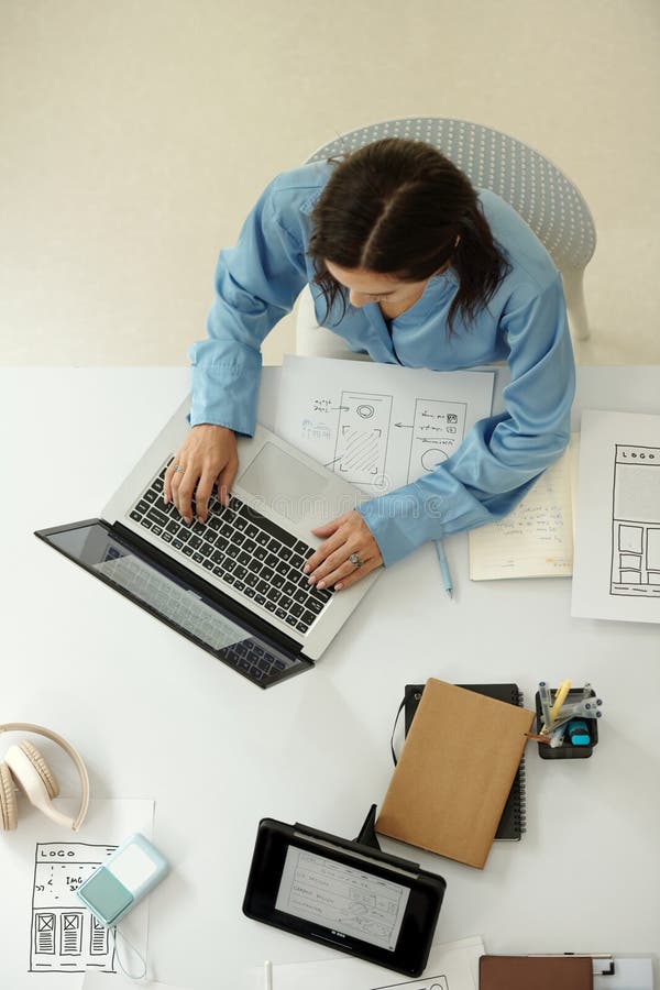 Working on Design Project from Above Stock Photo - Image of headphones ...