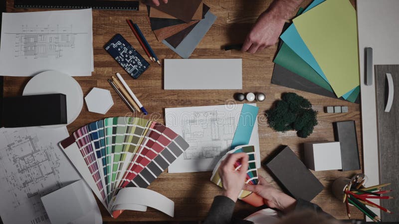 Working in a Design Studio. Interior Designers are Working with Various ...