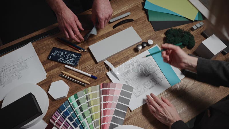 Working in a Design Studio. Interior Designers are Working with Various ...