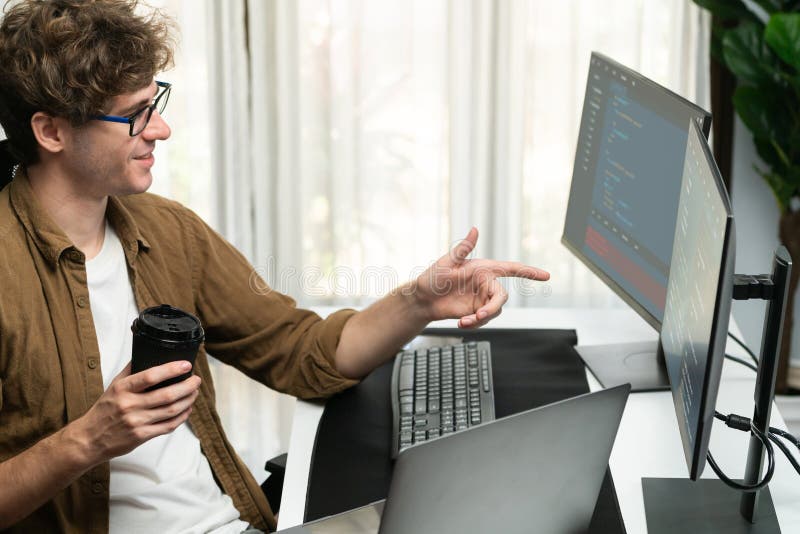 It Developer Holding Coffee Cup with Looking Online Software on Pc ...