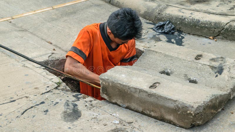 Working for drain cleaning editorial image. Image of open - 61756890