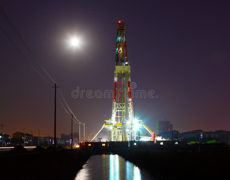 Drilling Rig at Night stock photo. Image of platform, moon - 7715884