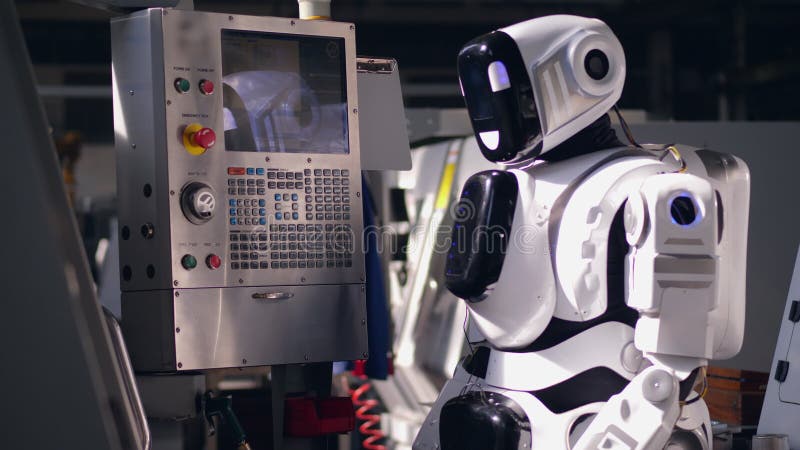Working Droid Pushes on Buttons on a Factory Machine. Stock Footage ...
