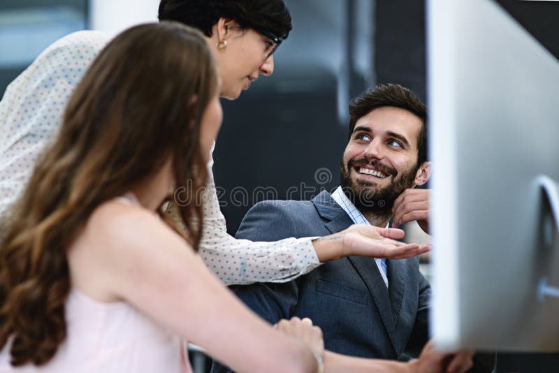 Working Efficiently with Technology at Their Side. Businesspeople ...