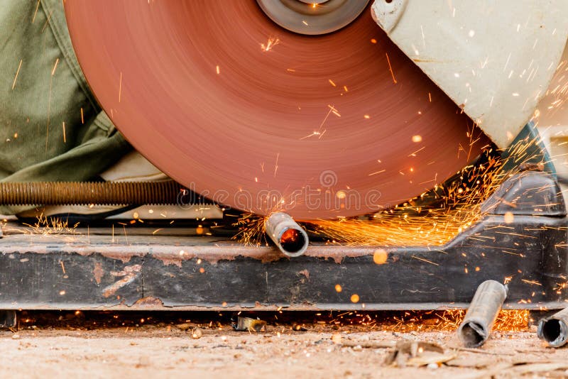 Working with Electric Grinder Tool on Steel Structure in Factory Stock ...