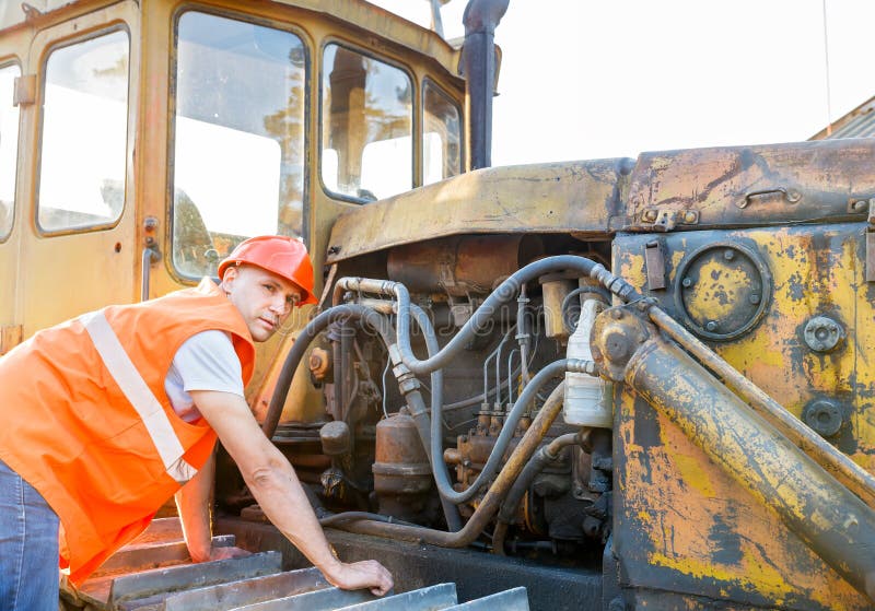 Working Examining Bulldozer Engine Stock Photo - Image of operation ...
